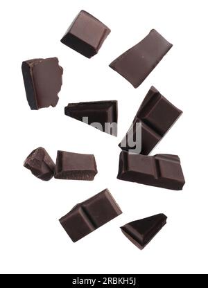 Pieces of chocolate bar falling on white background Stock Photo - Alamy