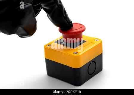 Finger pressing a nuclear button on a control panel. Composite image ...