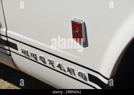 Mustang classic car badge and name on red paintwork Stock Photo - Alamy