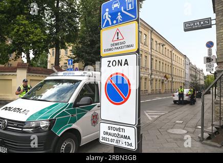 Genre photography. Police officers on duty on a city street. Credit ...