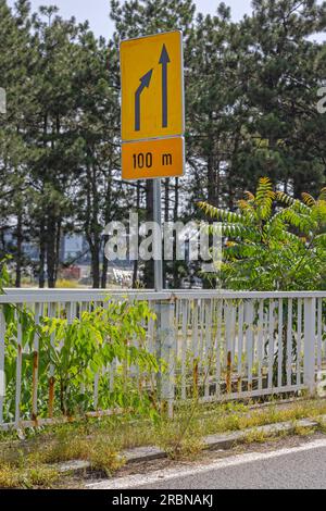 Merging Lane Traffic Ahead Road Sign Caution Stock Photo - Alamy