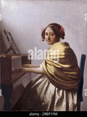 'Young Woman Seated at the Virginals' by Johannes Vermeer is an iconic ...