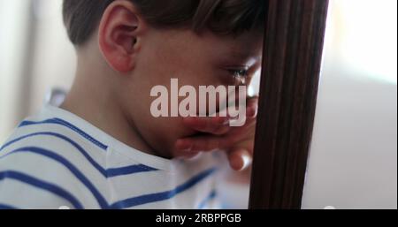Child crying tearful kid wiping tears feeling upset grounded boy Stock ...