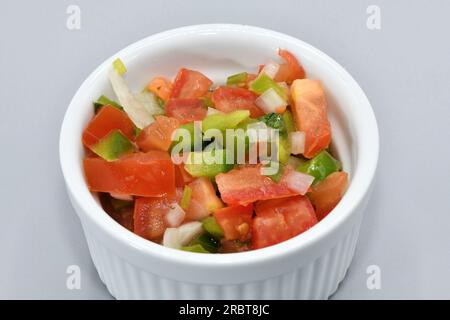 Salsa mix in a small white dish Stock Photo - Alamy