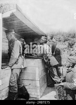 German WW1 machine gun crew firing from a trench on the Eastern Front ...