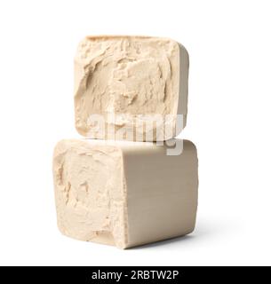 Blocks of compressed yeast isolated on white Stock Photo - Alamy