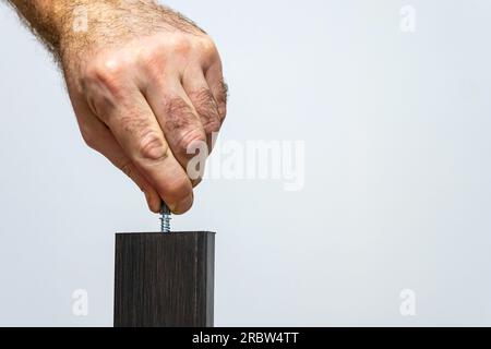 Hand and fittings. Inserting wood joints. Installation of wooden ...
