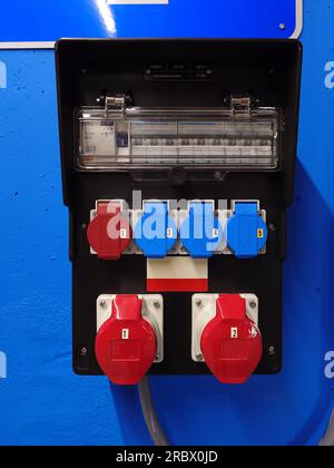 Wall mounted industrial electrical power socket and fuse box with plugs ...