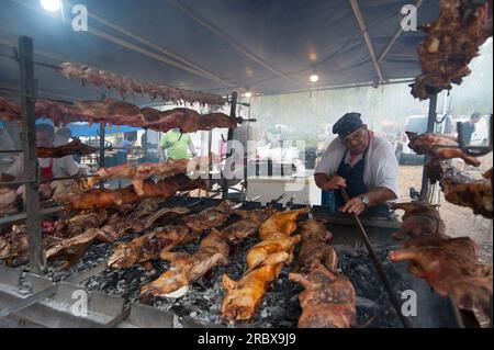 Porceddu, roast baby pork wrapped around a spit, “Cordula” made up of ...