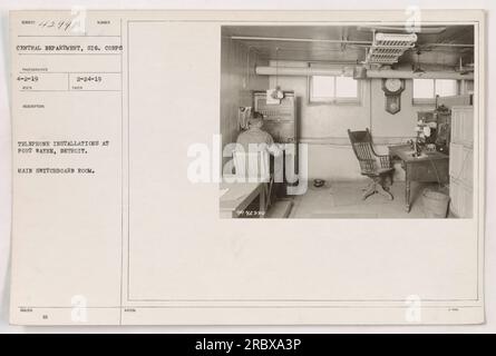 This historic image depicts a number of operators answering calls at ...