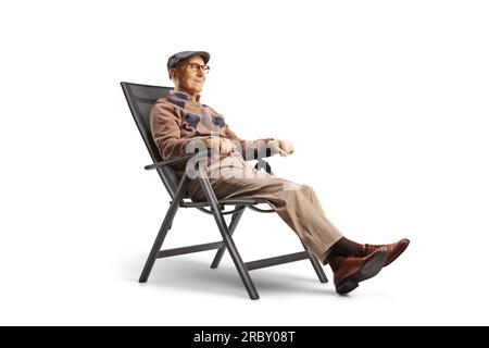 Elderly man resting in a foldable chair isolated on white background ...