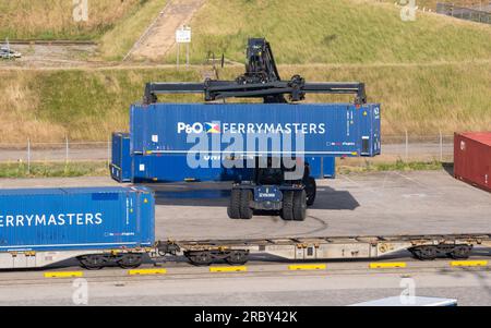 Container truck loaded onto truck in import-export logistics zone Stock ...