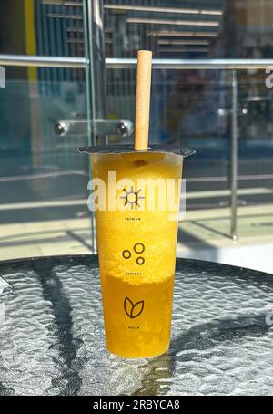 Fruit tapioca drink, Asian vegan beverage in hand Stock Photo - Alamy