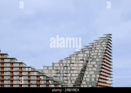 Low angel perspective view of minimal modern skyscraper with horizontal ...