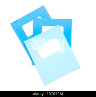 Different blue notebooks isolated on white background Stock Photo - Alamy
