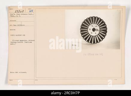 A Lewis machine gun with a 97-round magazine, magazine gauge, and ...