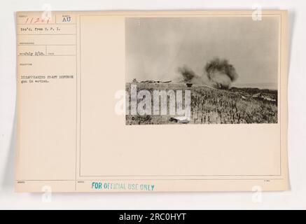 "American soldiers operating a disappearing gun in action during World ...