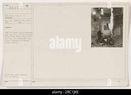 Sgt. Chas. E. Mace of the Signal Corps capturing images in St. Juvin ...