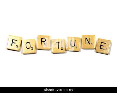 Fortune written with scrabble stones Stock Photo - Alamy