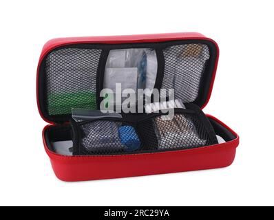 Red first aid kit with cotton buds, pins, pills, hand sanitizer and ...