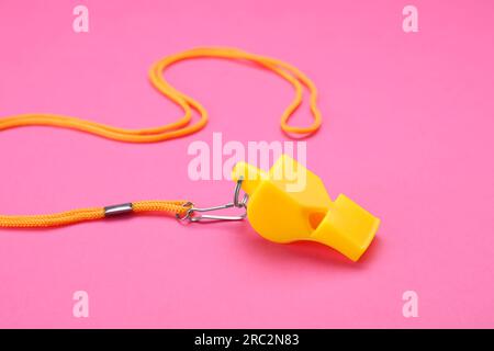 One yellow whistle with cord on white background, closeup Stock Photo ...