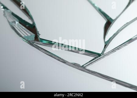 Broken mirror with many cracks as background, closeup view Stock Photo ...