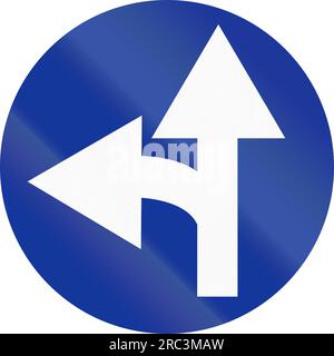 Polish traffic sign: Go left or right Stock Photo - Alamy