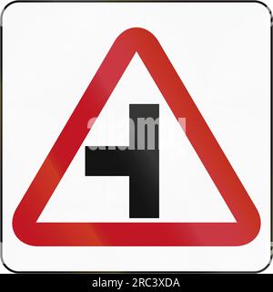 Bruneian danger warning sign: T-intersection Stock Photo - Alamy