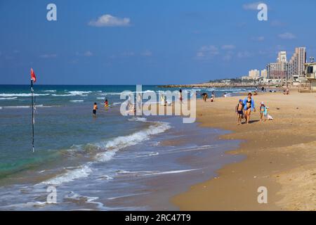 HAIFA, ISRAEL - NOVEMBER 1, 2022: People visit sandy Dado Beach in ...