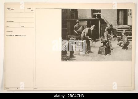 Soldiers working in an ordnance manufacturing facility during World War ...