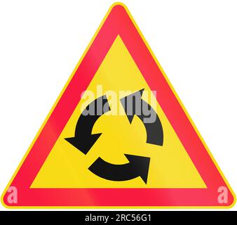 Roundabout intersection warning sign Stock Photo - Alamy