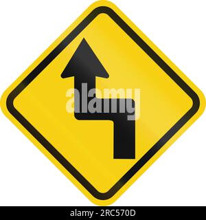 Colombian road warning sign: Reverse turn Stock Photo - Alamy