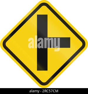Colombian road warning sign: T-Intersection ahead Stock Photo - Alamy