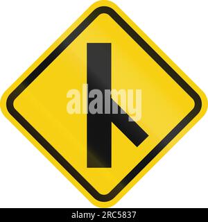 Colombian road warning sign: Merge from the left Stock Photo - Alamy