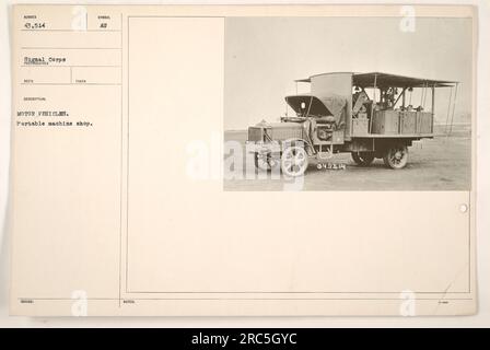A portable machine shop being used for motor vehicle repairs during ...