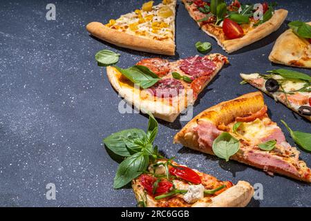 Various taste type pizza pieces with different traditional filling ...