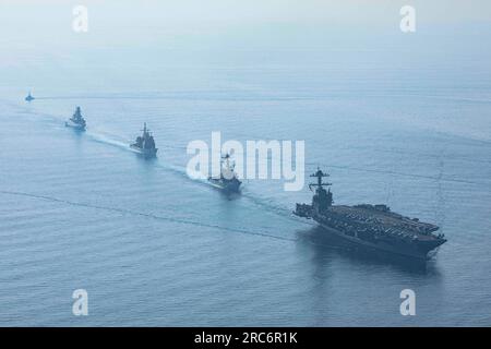 Italian guided missile frigate ITS Carabiniere (F593), observes an F/A ...