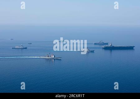 Italian guided missile frigate ITS Carabiniere (F593), observes an F/A ...
