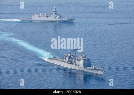 Italian guided missile frigate ITS Carabiniere (F593), observes an F/A ...