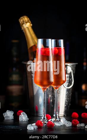 Raspberry Rossini alcoholic cocktail drink with prosecco, cava, or ...