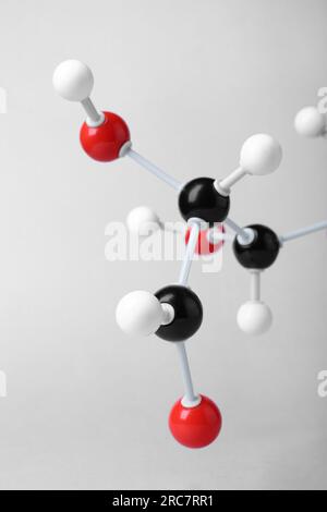Molecule of glucose on light grey background. Chemical model Stock ...