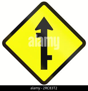 Indonesian road warning sign: Offset roads intersection ahead Stock Photo - Alamy