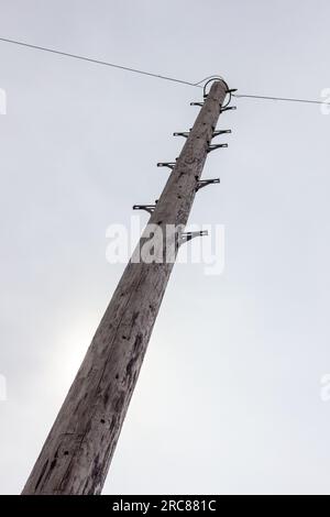 Looking up the rungs of a electricity pole - landscape orientation ...