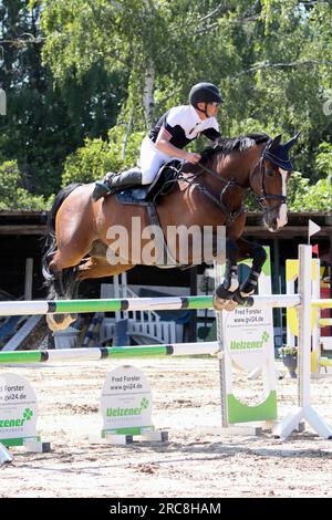 riders jump contest in germany Stock Photo - Alamy