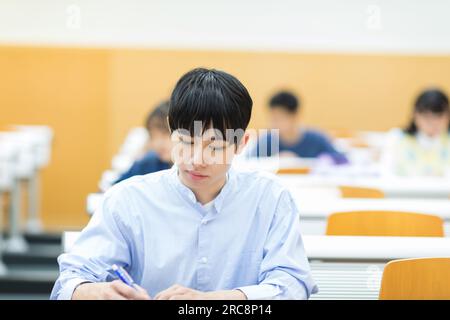 University students receiving a lecture Stock Photo - Alamy