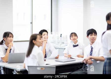 Students doing group work Stock Photo - Alamy