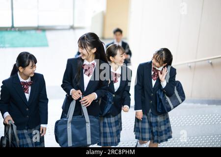 Students climbing stairs Stock Photo - Alamy