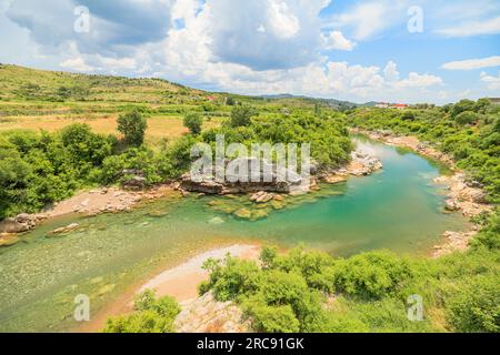 Drone view of the Mesi Bridge, located in Albania, is an architectural ...