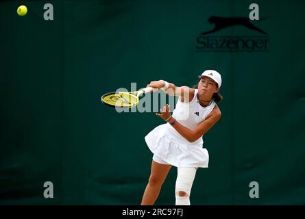 Ena Koike in action against Alina Korneeva in their Girl's Singles ...