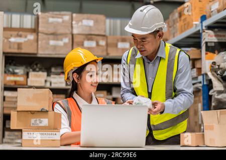 senior engineer manager supervisor working training young woman ...